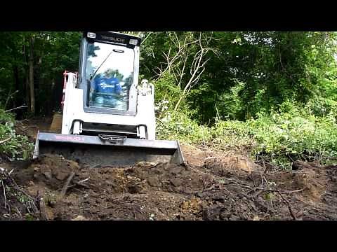 Takeuchi TL 240 Skid Steer Grading Road